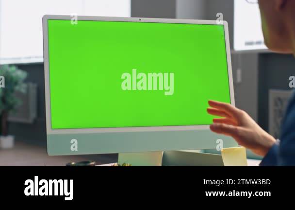 Manager video calling greenscreen computer at office room closeup ...