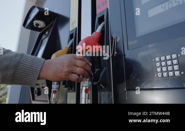 Close-up of hand and fuel injector. Obtaining a fuel injector. Fuel ...