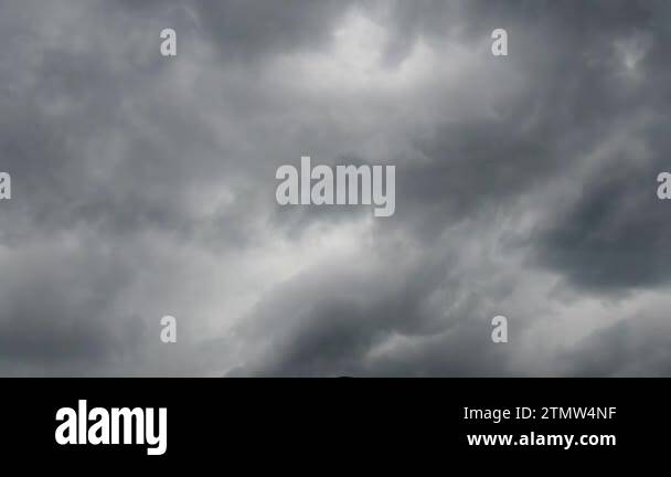 Terrible air whirlwind. Formation of a tornado. Cumulonimbus clouds, shower clouds ...