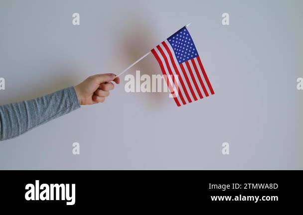 People hand us flag Stock Videos & Footage - HD and 4K Video Clips - Alamy