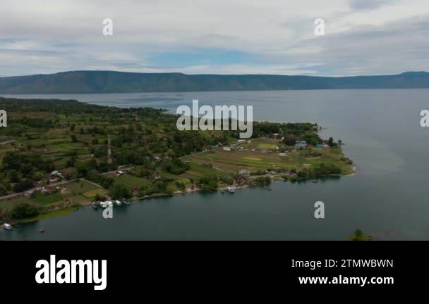 Lake Toba on the island of Sumatra in Indonesia, is the largest ...