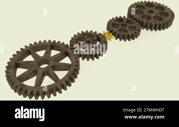 Five rotating gears in backgrounds Stock Video Footage - Alamy