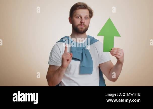 Man with arrow sign Stock Videos & Footage - HD and 4K Video Clips - Alamy