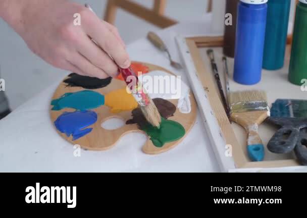 The process of creating an oil painting in the workshop by a ...