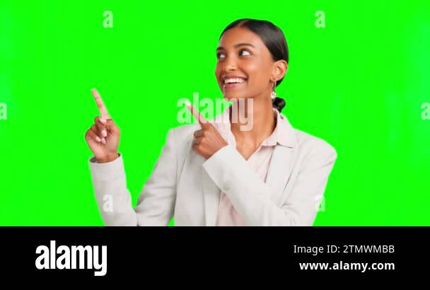 Woman, face and pointing with green screen and mockup up with happiness and smile. Isolated ...