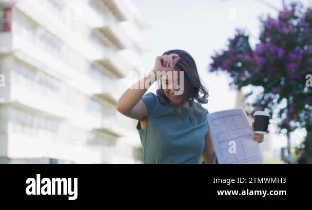 Happy, dance and businesswoman in celebration in the city for success ...