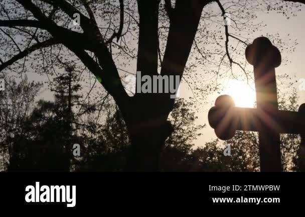 Holy cross glowing in evening sunset sunshine as symbol for jesus ...