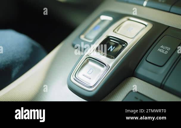 Starting car engine. Track in to the button. Finger press the button to ...