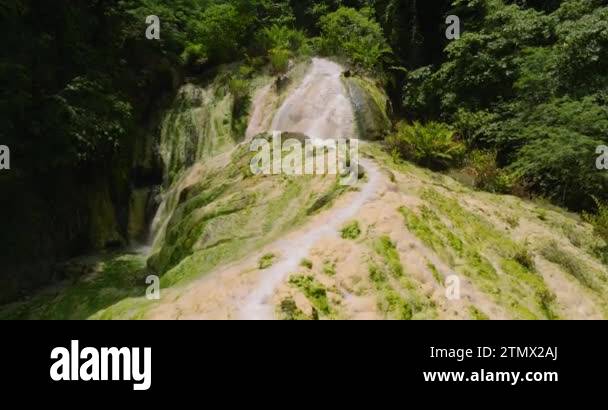Beautiful top down view of Bilawa Mainit Hot Waterfall. Davao de Oro ...