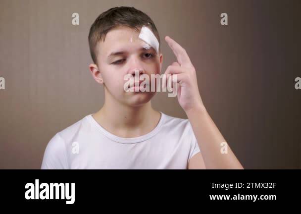 Bump on forehead in Stock Videos & Footage - HD and 4K Video Clips - Alamy