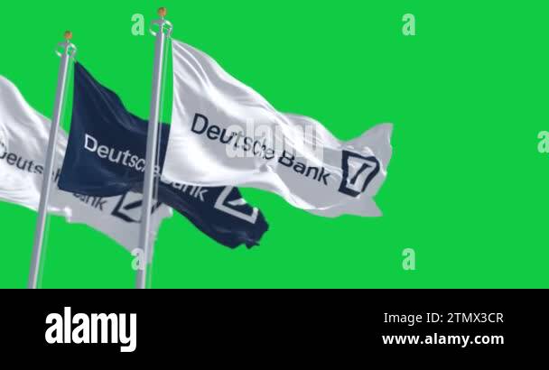 Berlin, DE, March 2023: Deutsche Bank flags waving isolated on a green ...