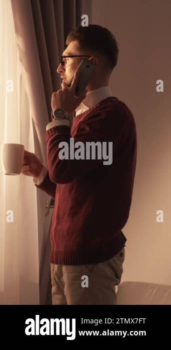 Vertical video. Important call. Elegant man. Mobile communication ...