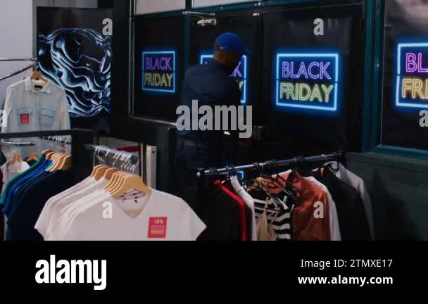 Diverse shoppers argue with security guard, waiting for black friday ...