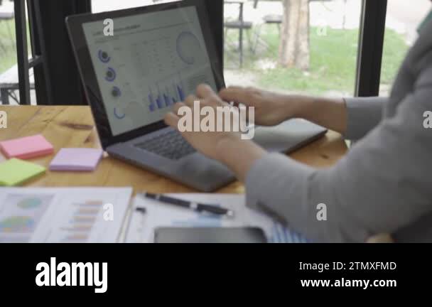 Asian business man Sitting working on laptop with office syndrome problem back and shoulder pain ...