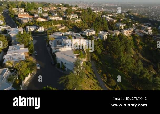 High angle view of rows of residences in Hollywood Hills. Tilt up ...