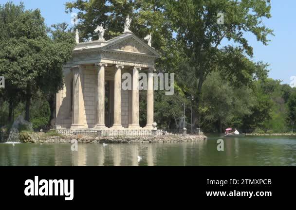 Villa Borghese, Rome, city park with Esculapio temple tourists and pond ...