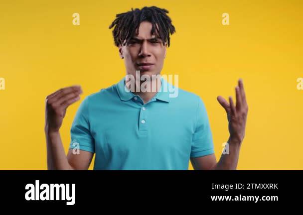 Irritated african american guy showing bla-bla-bla gesture with hands ...