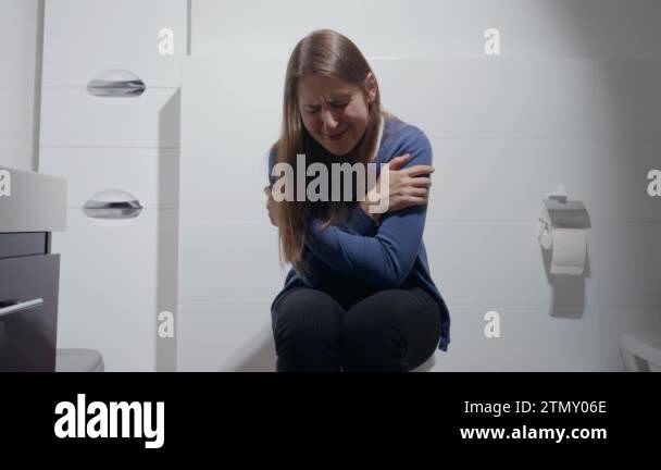 lonely woman feeling unhappy and upset crying in bathroom. Concept of ...