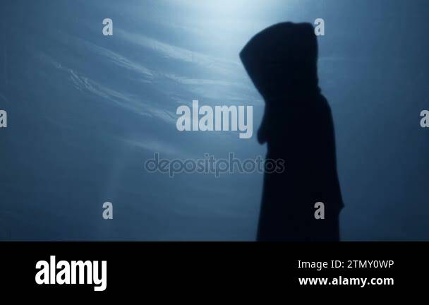 Grim Reaper silhouette preparing sharp scythe to collect victim, fear ...