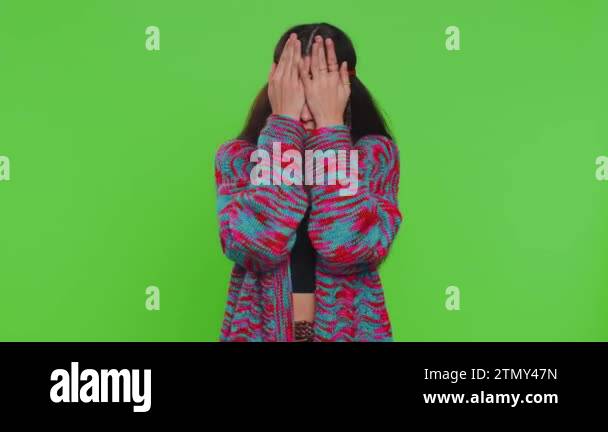 Dont want to look at this, awful. Afraid woman closing eyes with hand ...