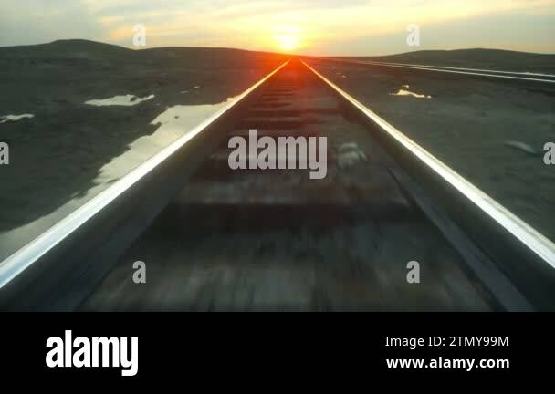 Camera moves along railway. Wonderful sunset. Realistic cinematic 4k ...