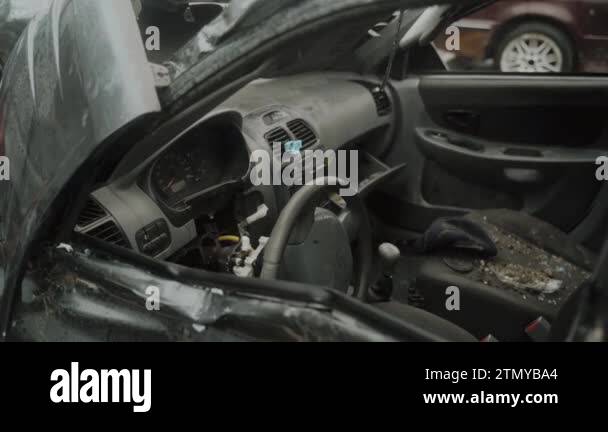 Cemetery of civilian cars. Car destroyed in missile attack, civilian ...
