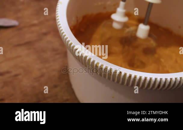 Mixing cream for cake filling in a blender close up Stock Video Footage ...