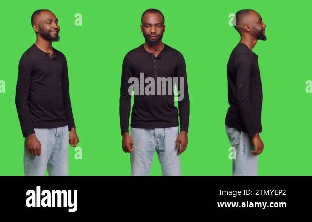 Young male model feeling stylish posing on camera, standing over ...