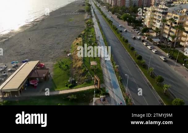 Explore the mesmerizing sight of an oceanic roadway as the drone ...