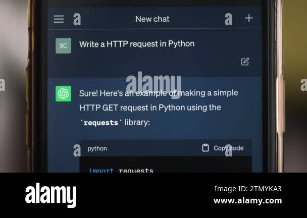 CHISINAU, MOLDOVA - APRIL, 2023: A smartphone with opened AI ChatGPT in it. User asking chat bot ...