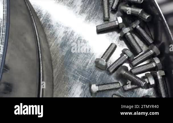 Process of production of bolts. Industrial concept. Factory equipment ...