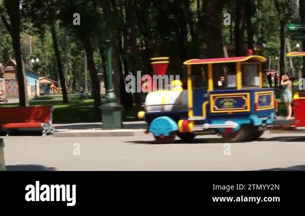 Stylized steam locomotive in the park of Kharkiv rolls children and ...