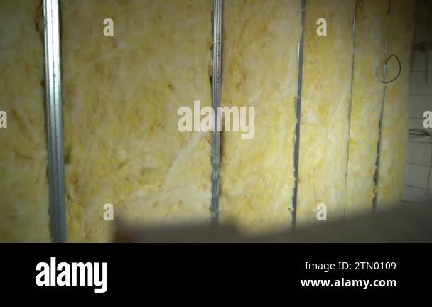 The partition between the rooms is filled with glass wool. Universal ...