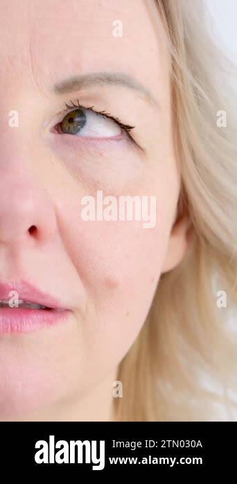 move eyes up and down obliquely woman does gymnastics blinks eyes often ...