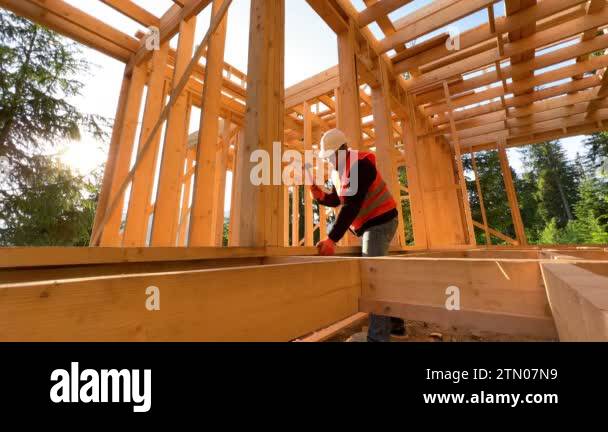 Carpenter constructing wooden frame Stock Videos & Footage - HD and 4K Video Clips - Alamy