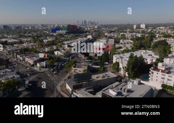 Aerial panoramic view of metropolis, traffic in streets around Pacific ...