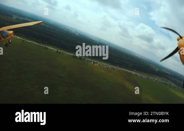 Flying in a light airplane. The camera is attached to the wing of the ...