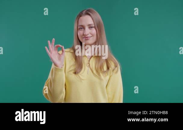 Pretty woman makes hand sign okay, ok gesture. Happy girl, correct ...