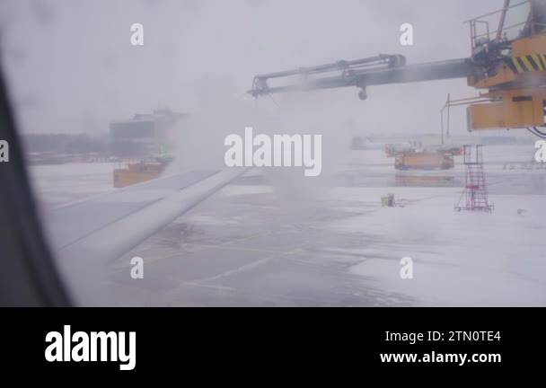 Treatment of the wing of the aircraft with anti-icing liquid at the ...