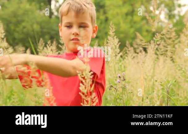 Boy touching legs Stock Videos & Footage - HD and 4K Video Clips - Alamy