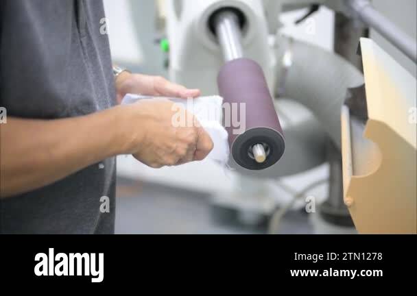 Prosthetic technician sculpting plaster cast for socket at prosthetic production factory, High ...