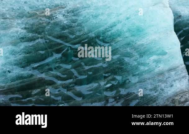 Massive block of cracked vatnajokull ice in iceland, crevasse with icy ...