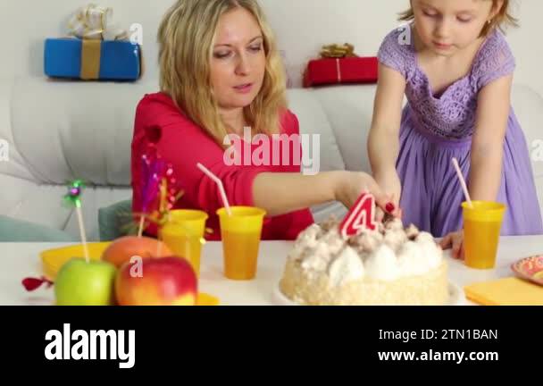 Mother with his family to cut cake Stock Videos & Footage - HD and 4K ...
