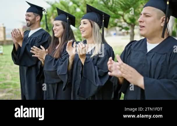 Group of people students graduated clapping applause at university ...