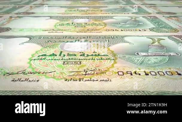 Banknotes of ten dirhams arabs rolling on screen, cash money, loop ...