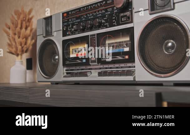 Music from a vintage boombox player. Analog sound from an old audio ...