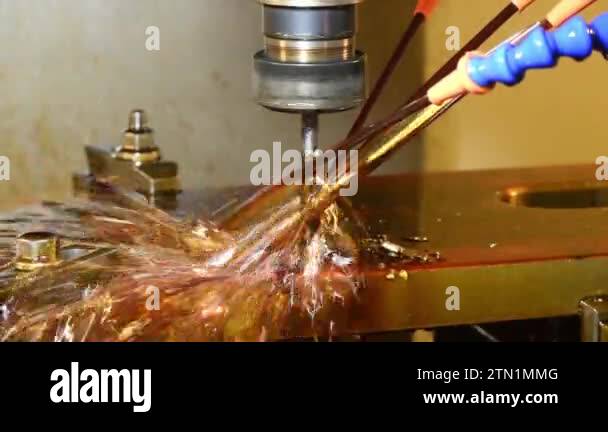 The canned cycle drilling process on the CNC milling machine with oil ...