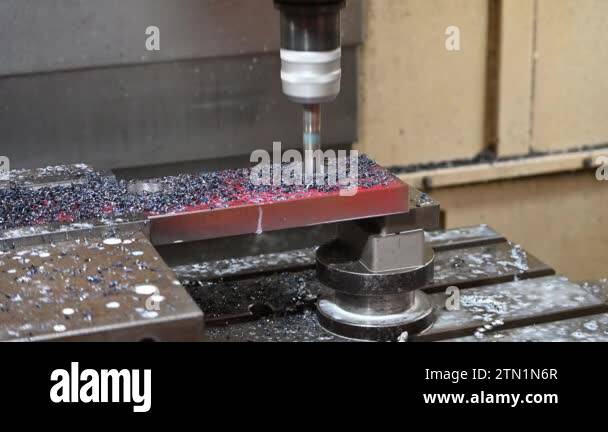 4K scene CNC milling machine rough bore cutting the metal plate parts ...
