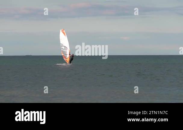 Modern water sport. Hydrofoil ride on the ocean using the wing and the ...