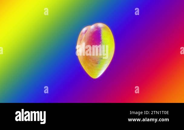 Pride month: Glowing 3d heart slowly rotating on LGBT flag background ...